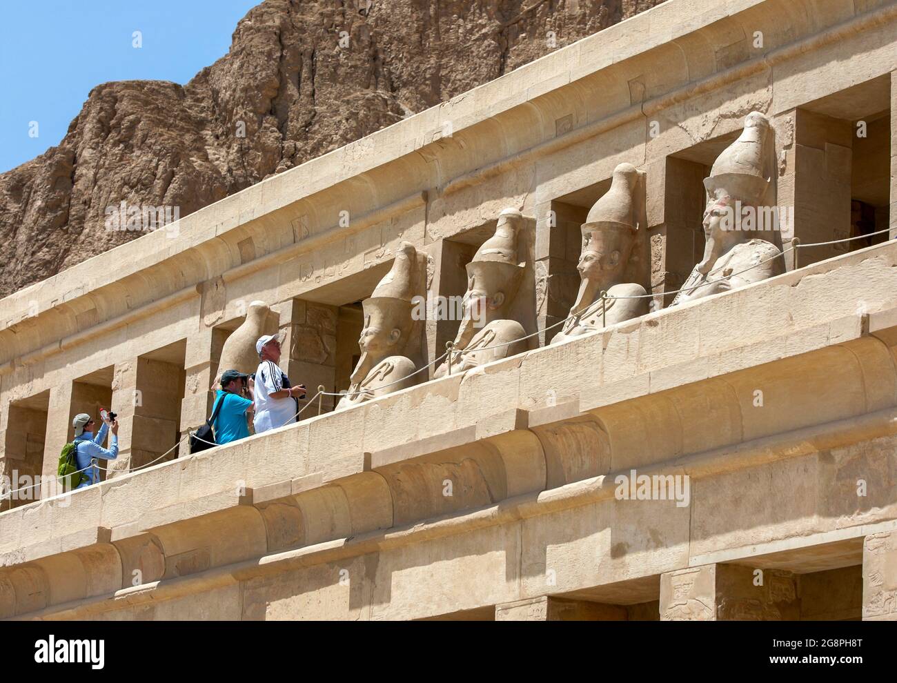 The row of Osiris pillars which stand along the upper terrace at the ...