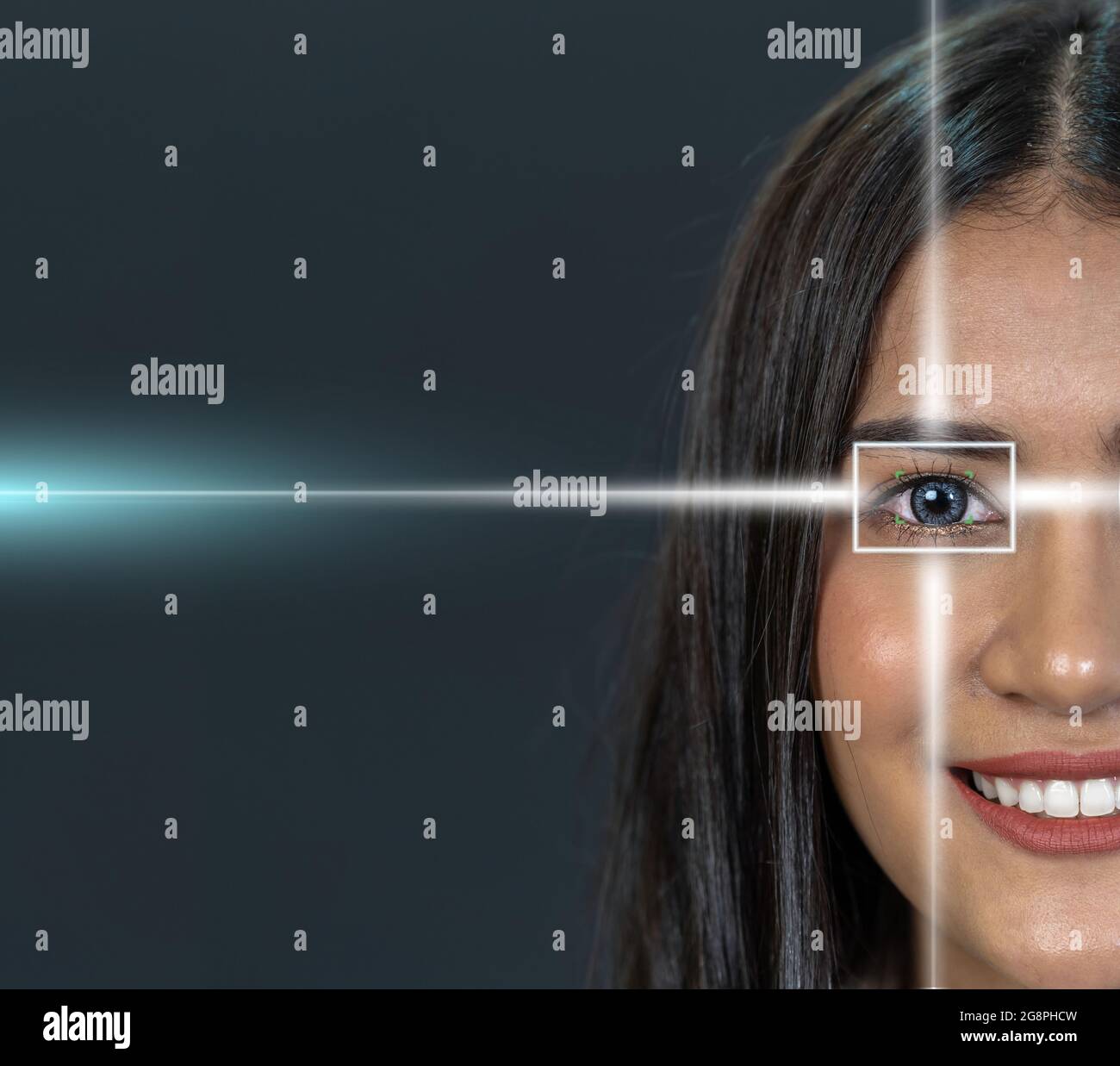 Eye scanning of asian young woman by laser light over the dark ...