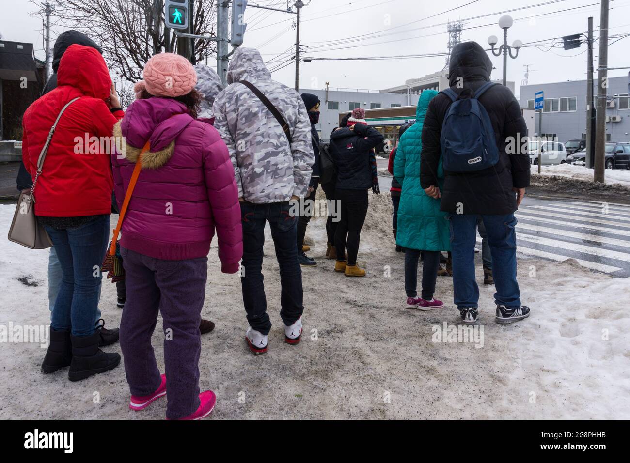 Otaru, Japan - December 25, 2017: Unidentified pedestrians walk in ...