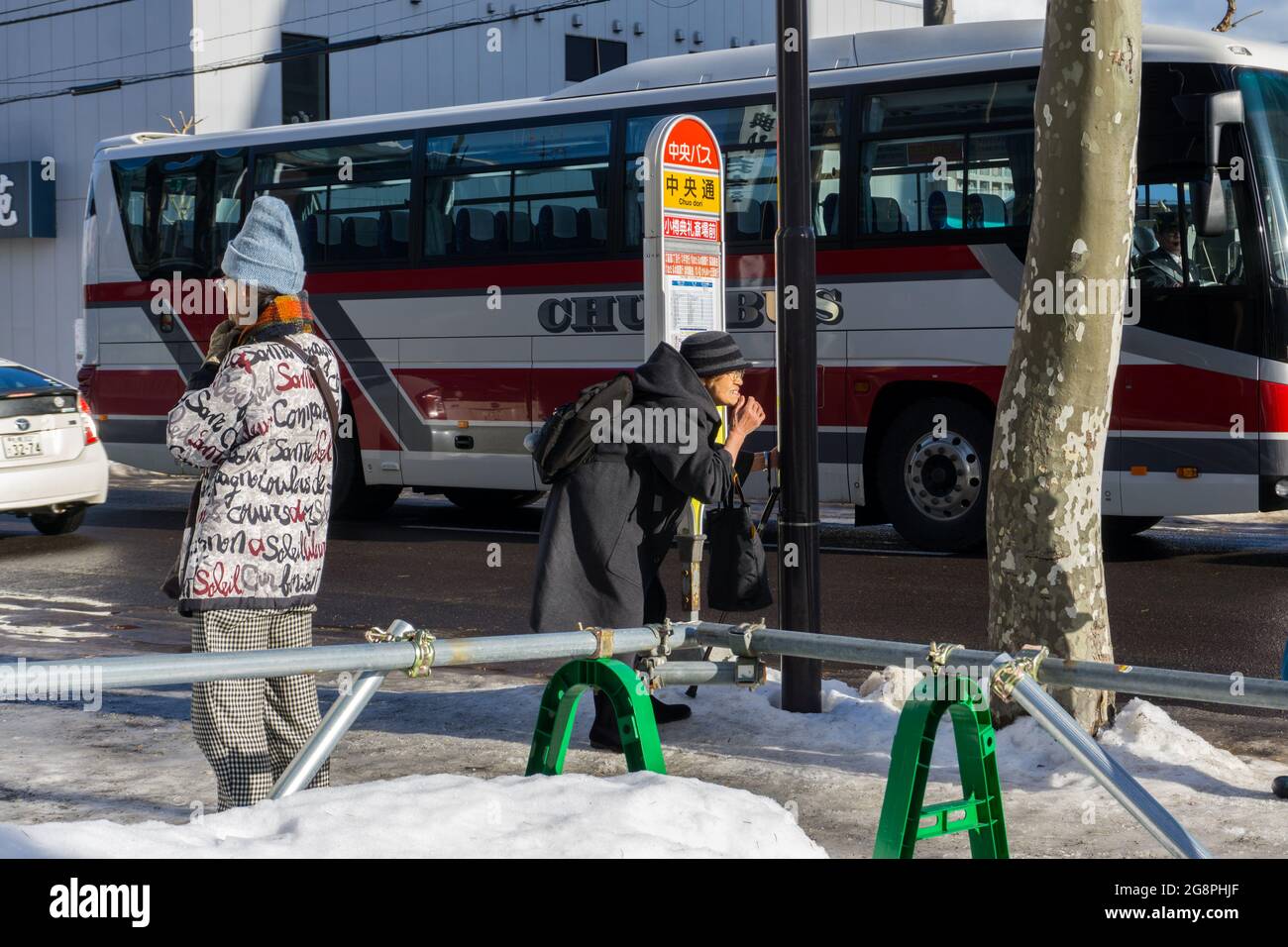 Otaru, Japan - December 25, 2017: Unidentified pedestrians walk in ...