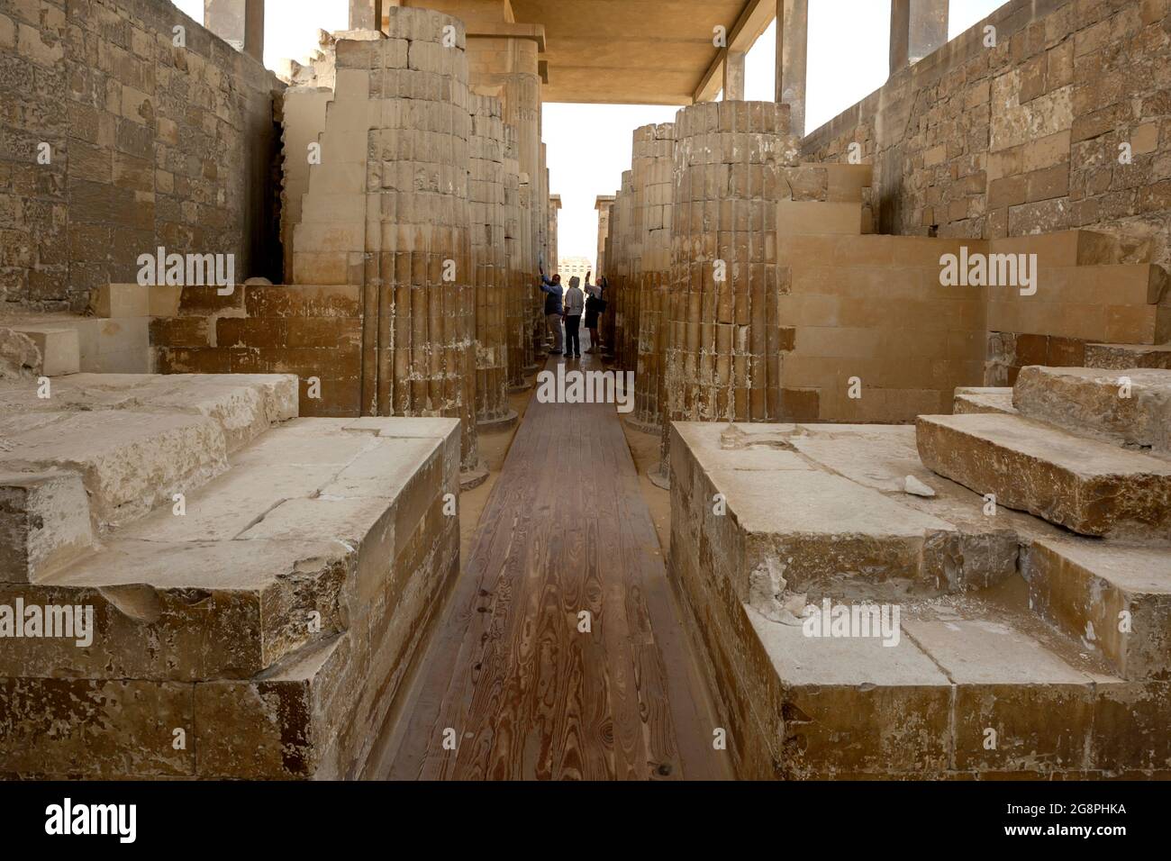 Tourists admire the stone carved columns of the Hypostyle Hall at the ...