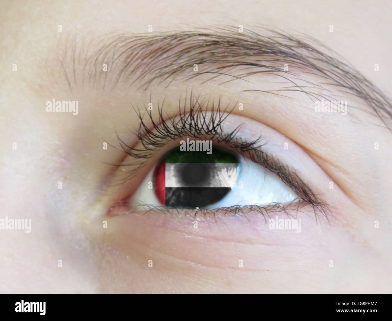 Portrait of a young girl with the color of the eyes of the flag of ...