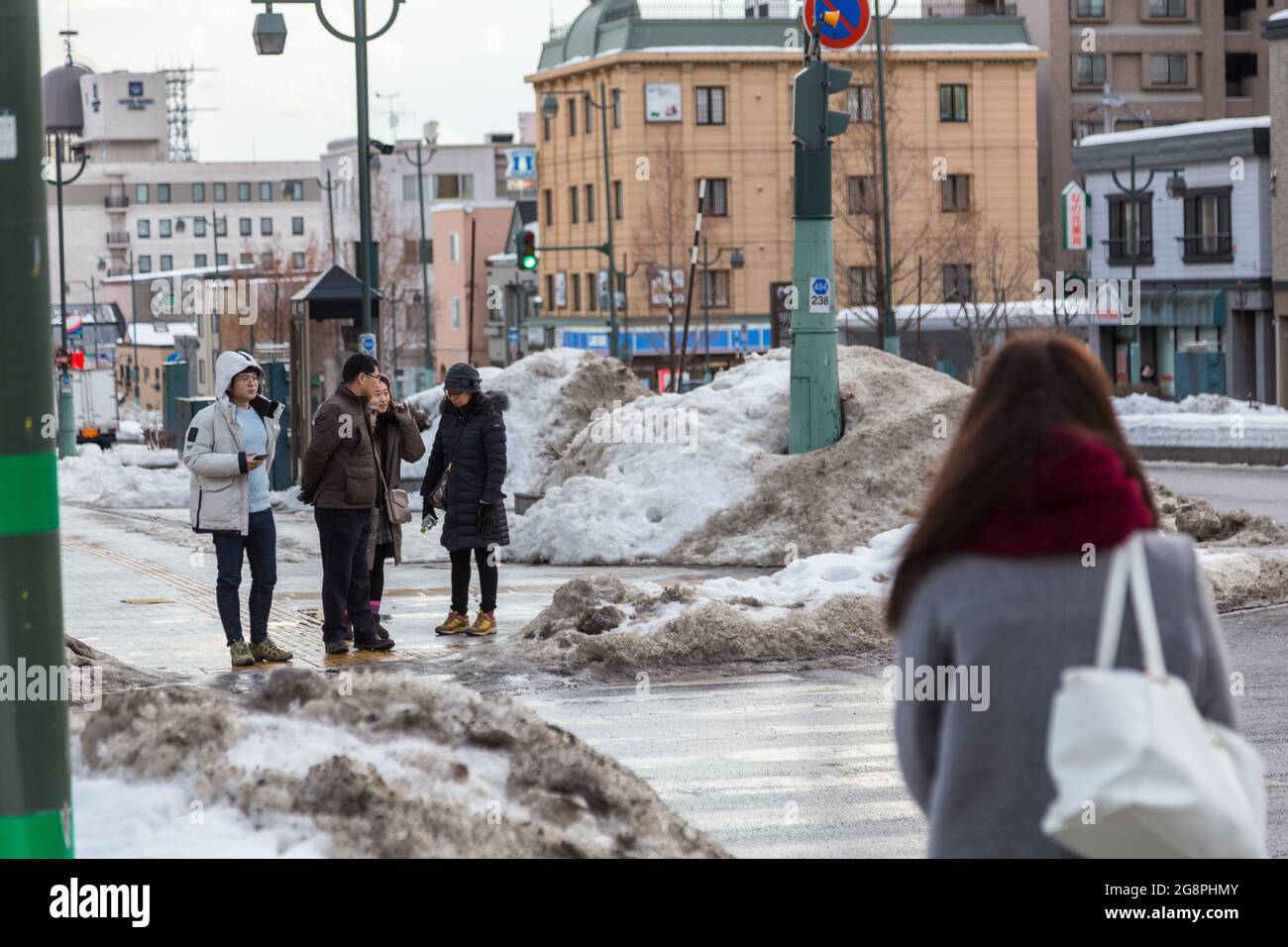 Otaru, Japan - December 25, 2017: Unidentified pedestrians walk in ...