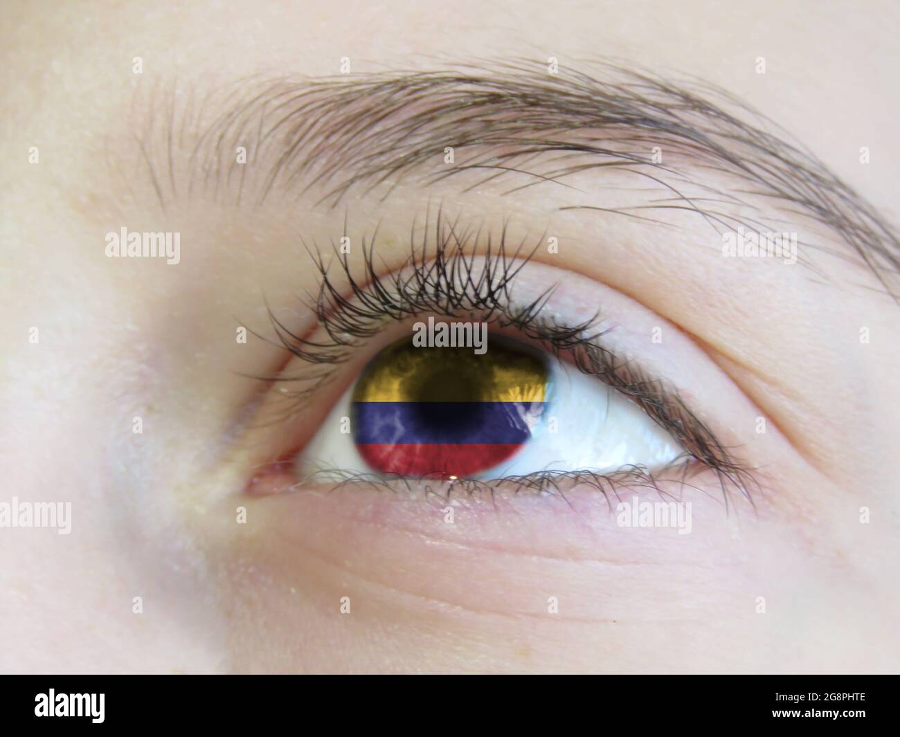 Portrait of a young girl with the color of the eyes of the flag of ...