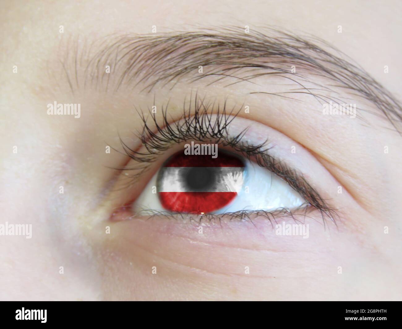 Portrait of a young girl with the color of the eyes of the flag of ...