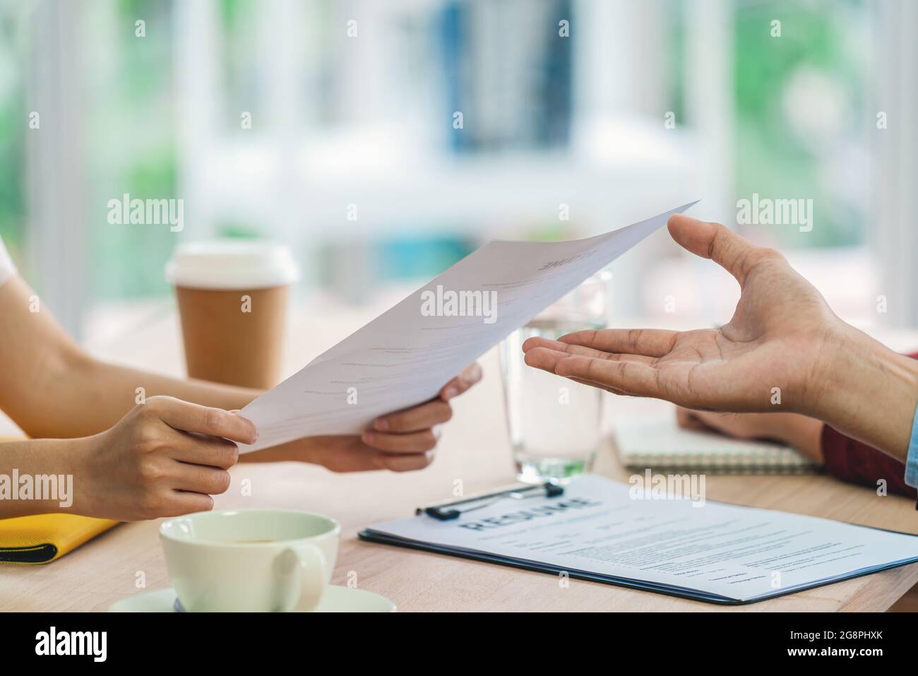 Closeup Young Asian woman graduate hand holding and Submitting the ...