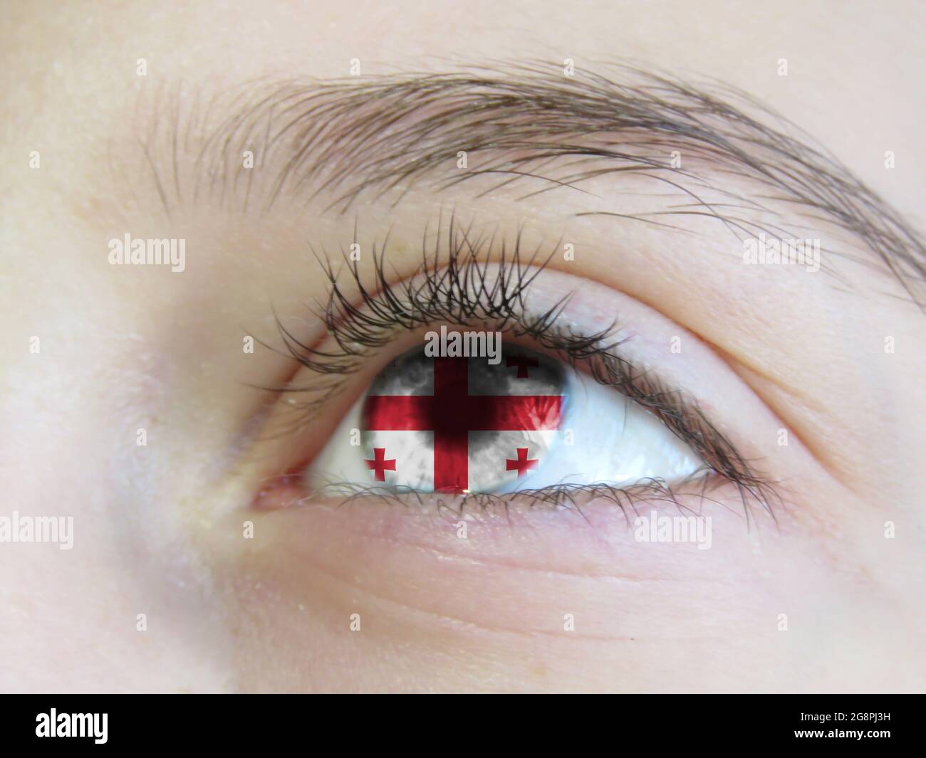Portrait of a young girl with the color of the eyes of the flag of ...