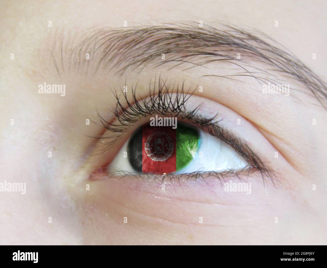 Portrait of a young girl with the color of the eyes of the flag of ...