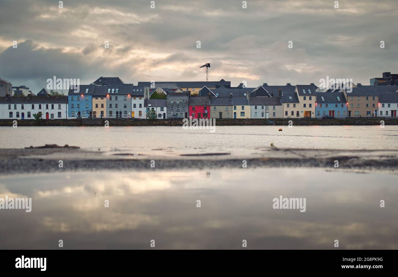 Beautiful cityscape with colorful houses by the Corrib River at ...