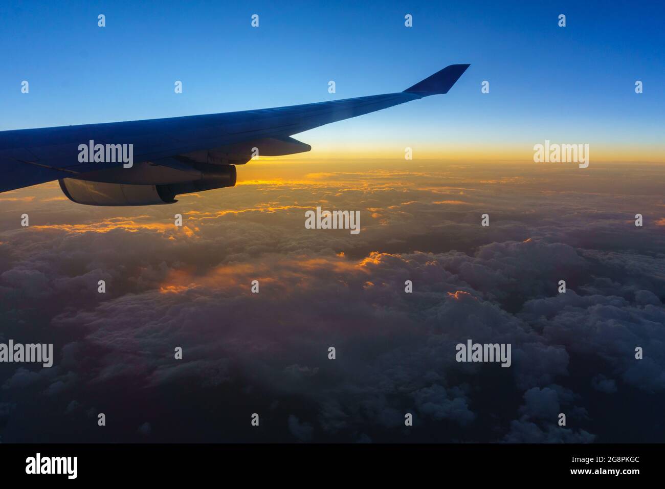 Beautiful sunrise with aircraft wing during View from windows aircraft ...
