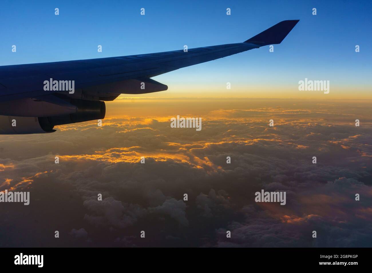 Beautiful sunrise with aircraft wing during View from windows aircraft ...