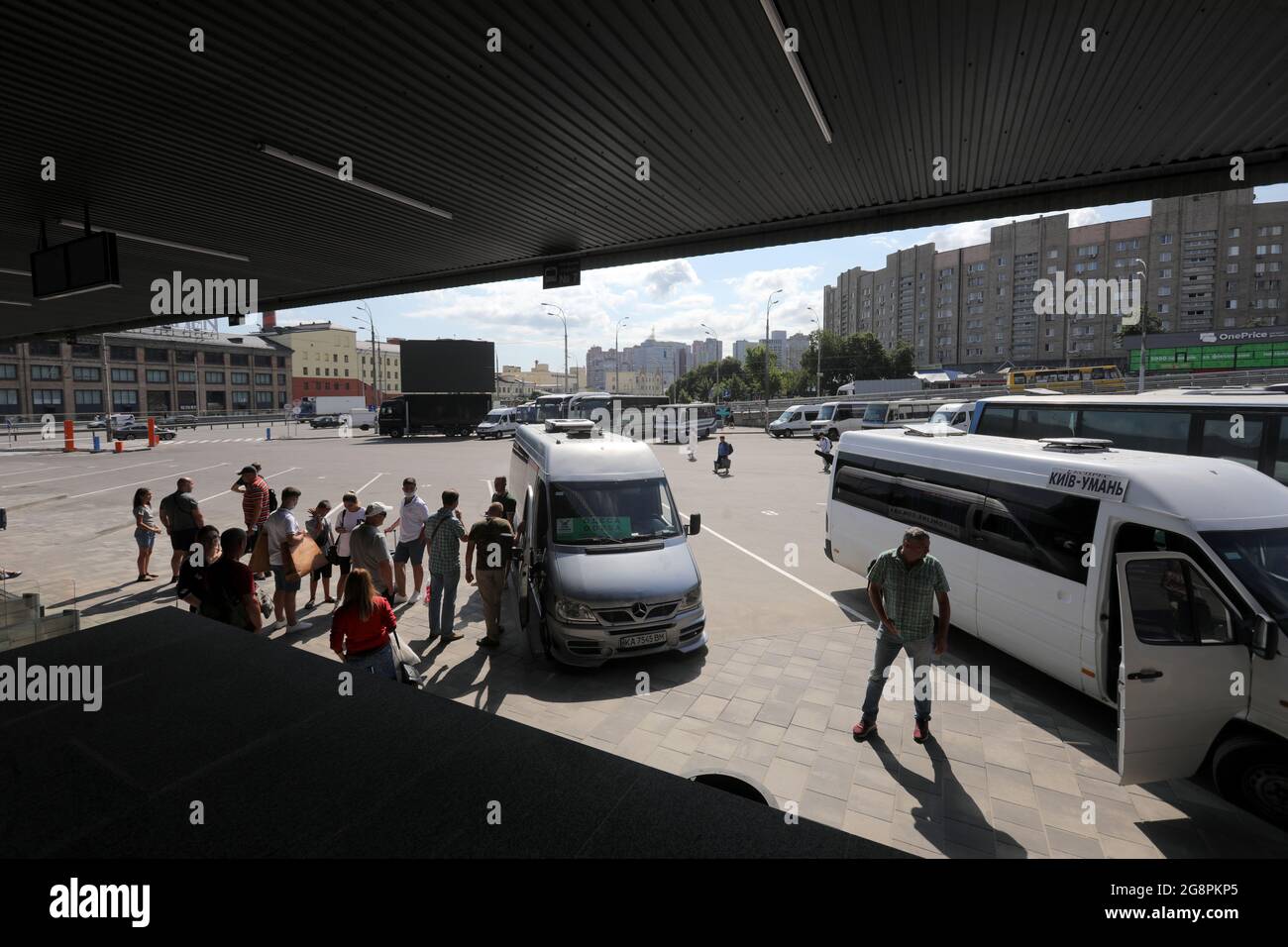 KYIV, UKRAINE - JULY 22, 2021 - Passengers stay by the buses at the ...
