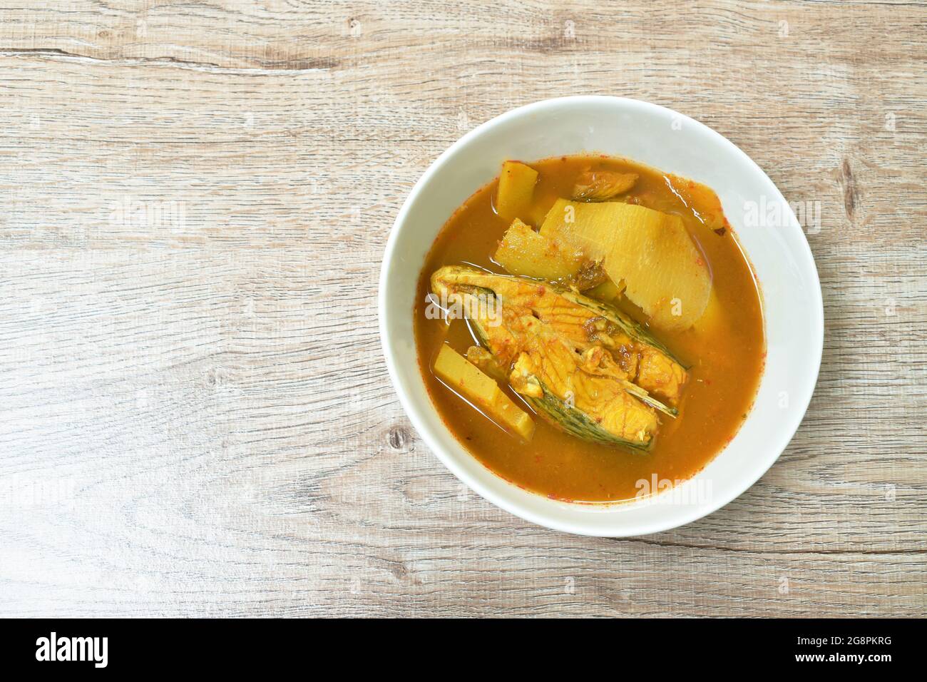 boiled red mango fish with pickled bamboo shoot in spicy and sour soup ...