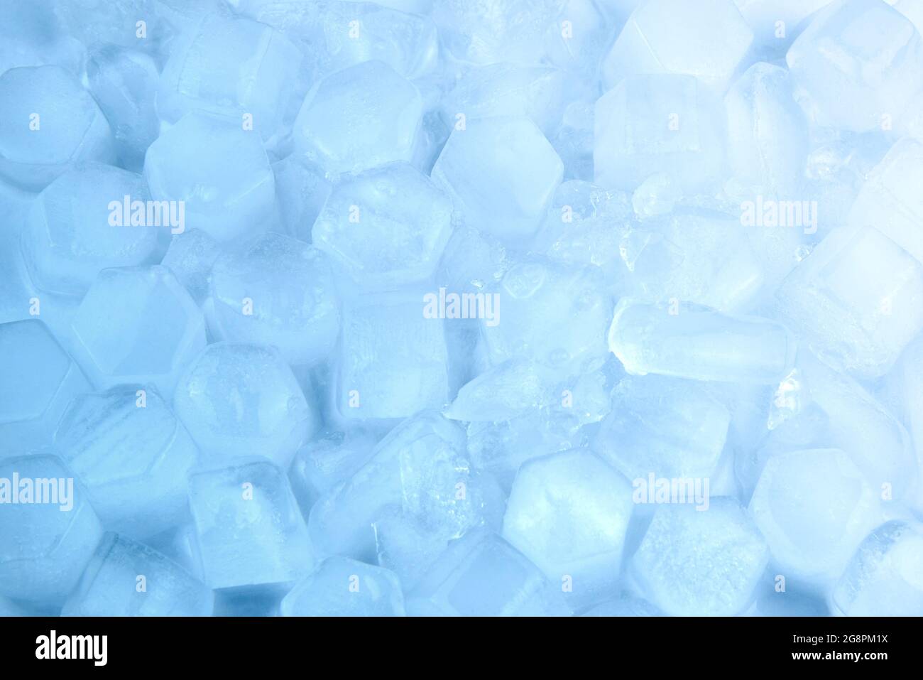Hexagonal pieces of melted blue ice, close-up, background Stock Photo ...