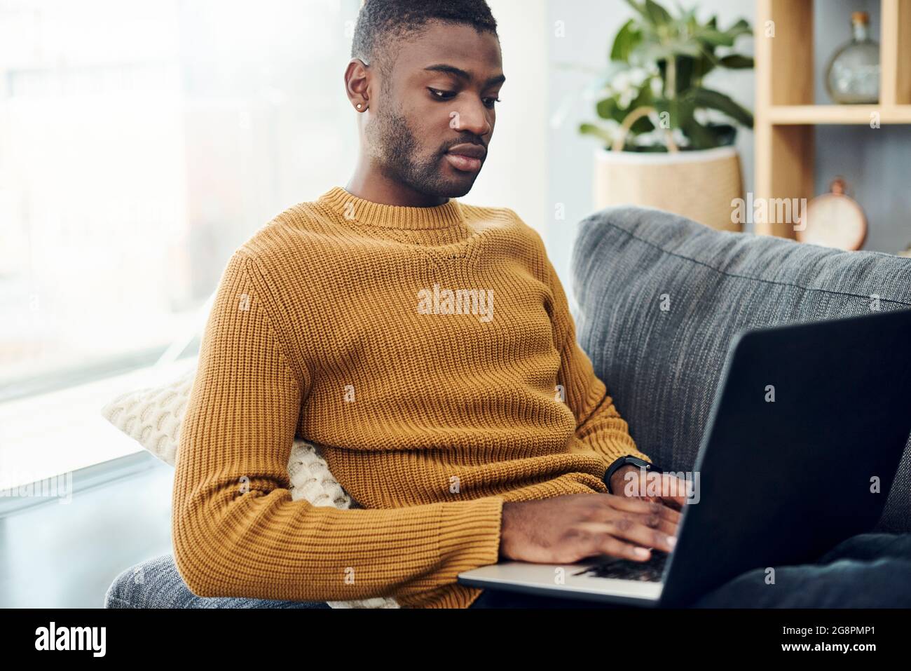 Taking time out to chill with his connections Stock Photo - Alamy