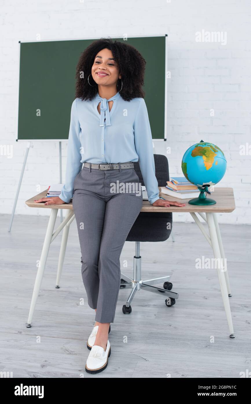 Smiling african american teacher hi-res stock photography and images ...