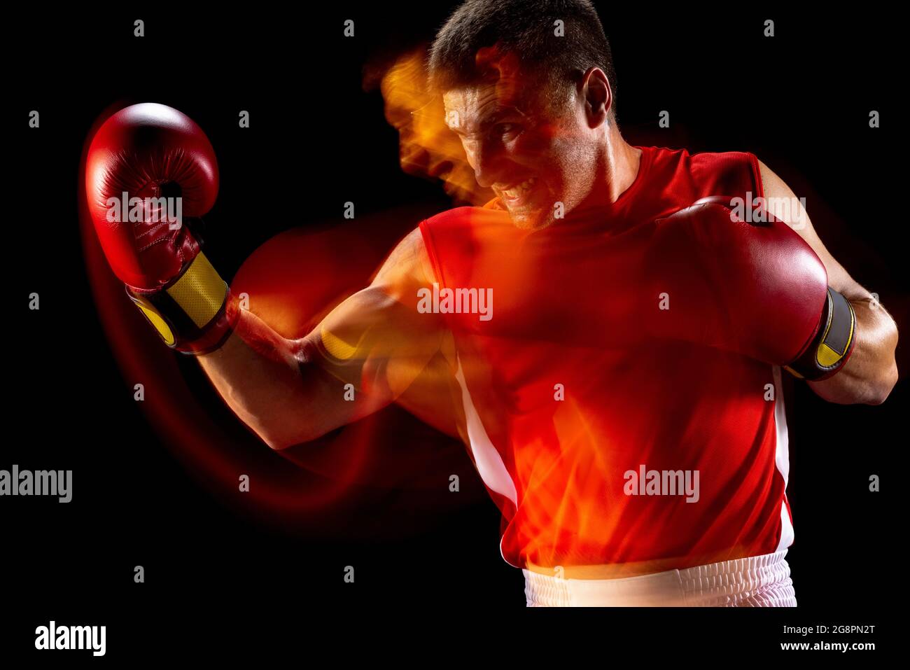 Side view portrait of one professional male boxer in red sportswear and ...