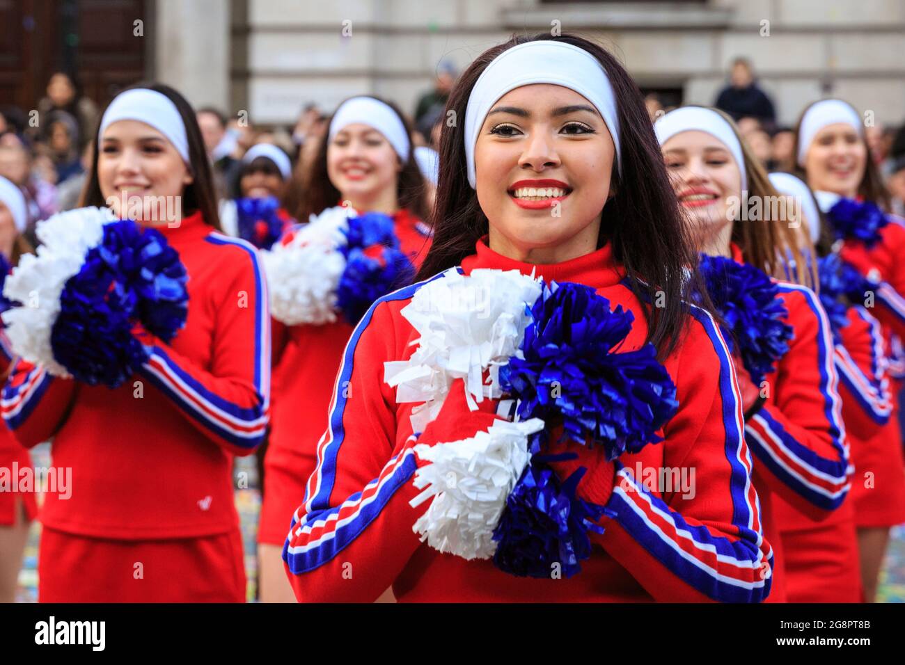 Cheerleaders with pom poms hi-res stock photography and images - Alamy