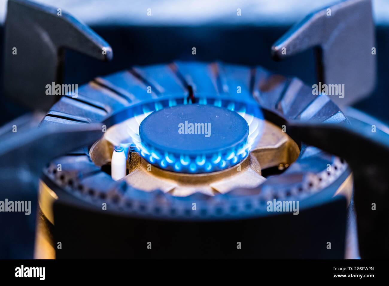 Open the gas valve and put the pot on the stove Stock Photo - Alamy