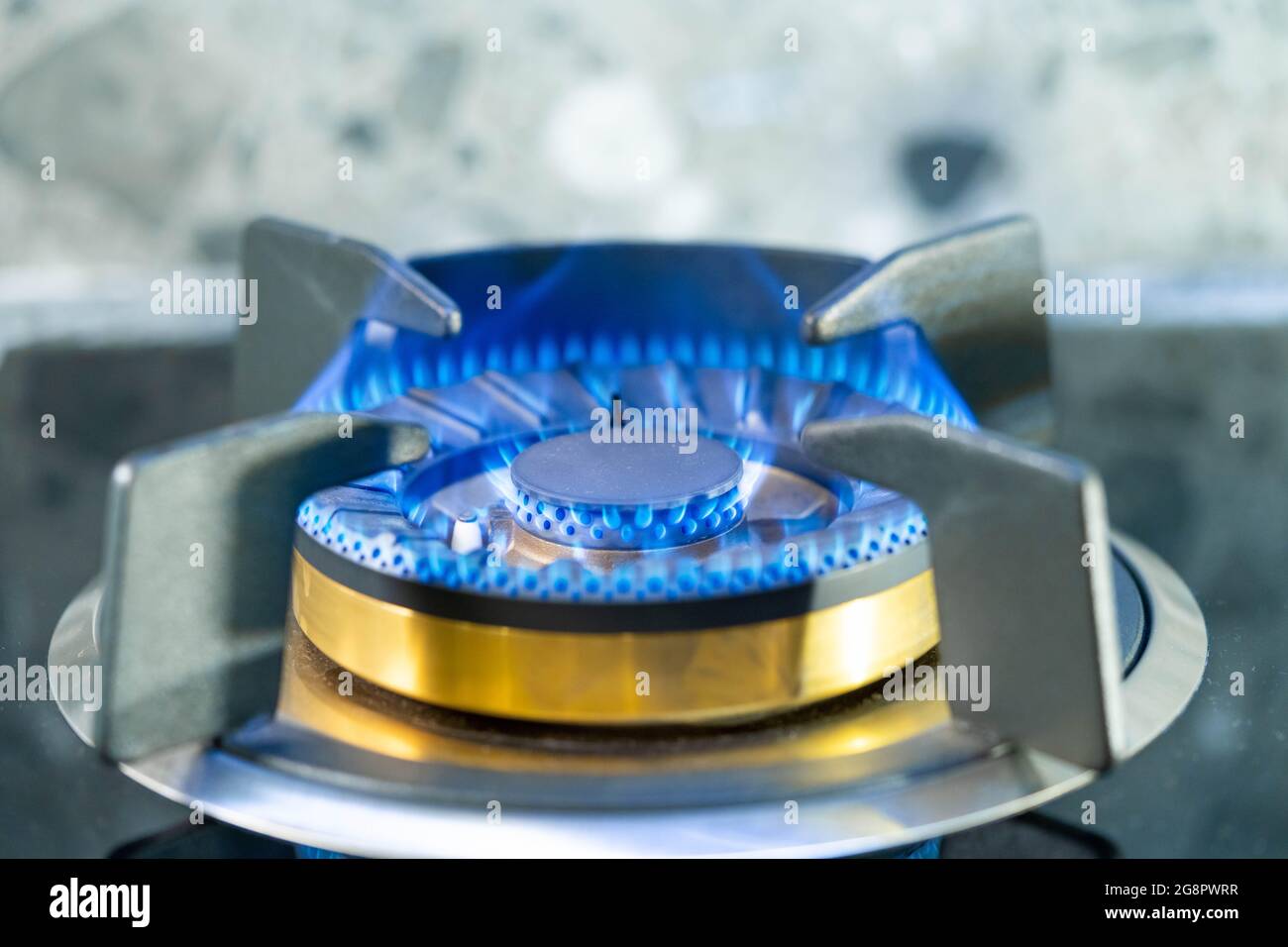 Open the gas valve and put the pot on the stove Stock Photo - Alamy