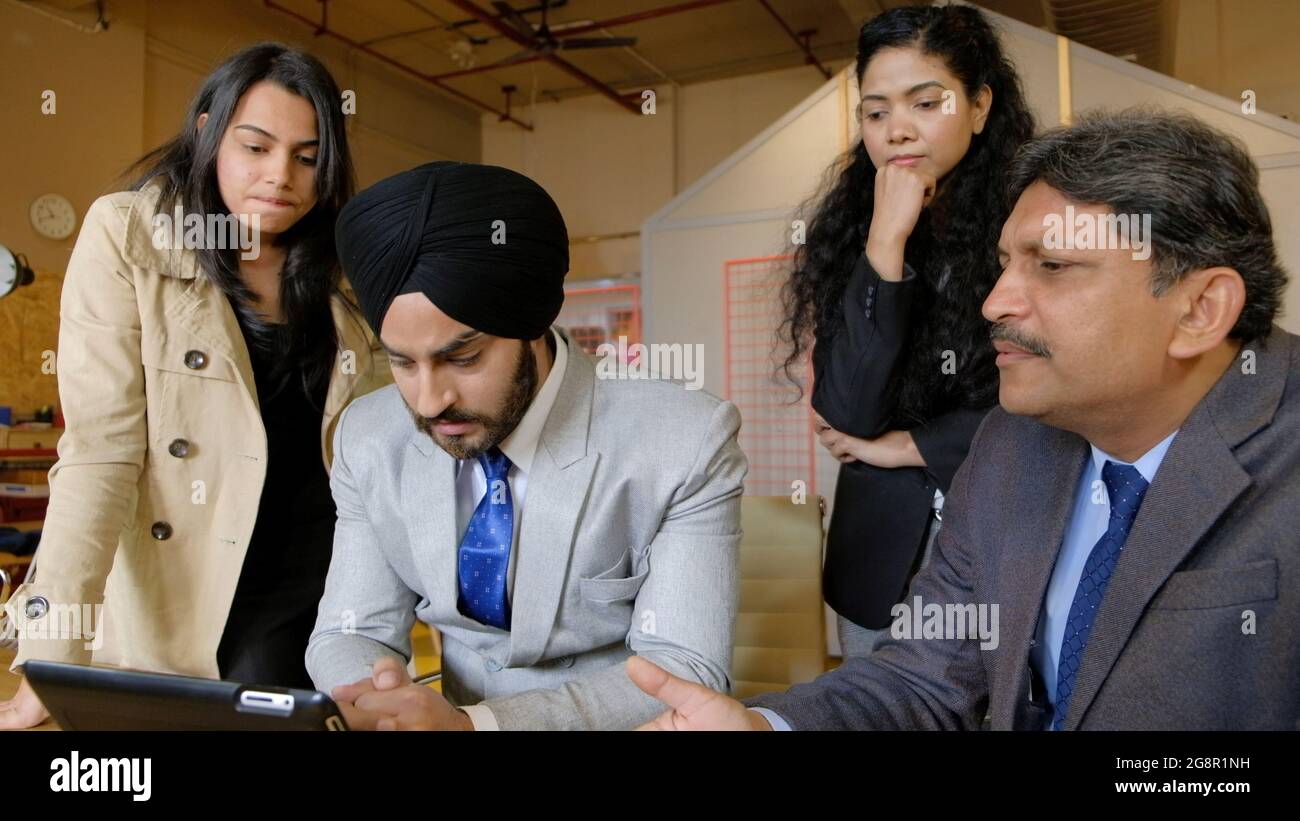 Group of Indian businesspeople during a meeting Stock Photo - Alamy