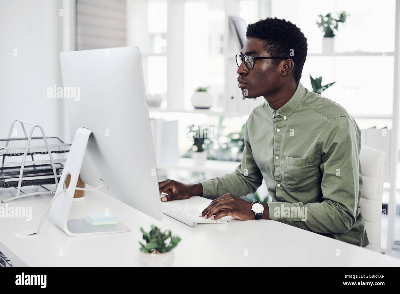 Focused on his big upcoming project Stock Photo - Alamy