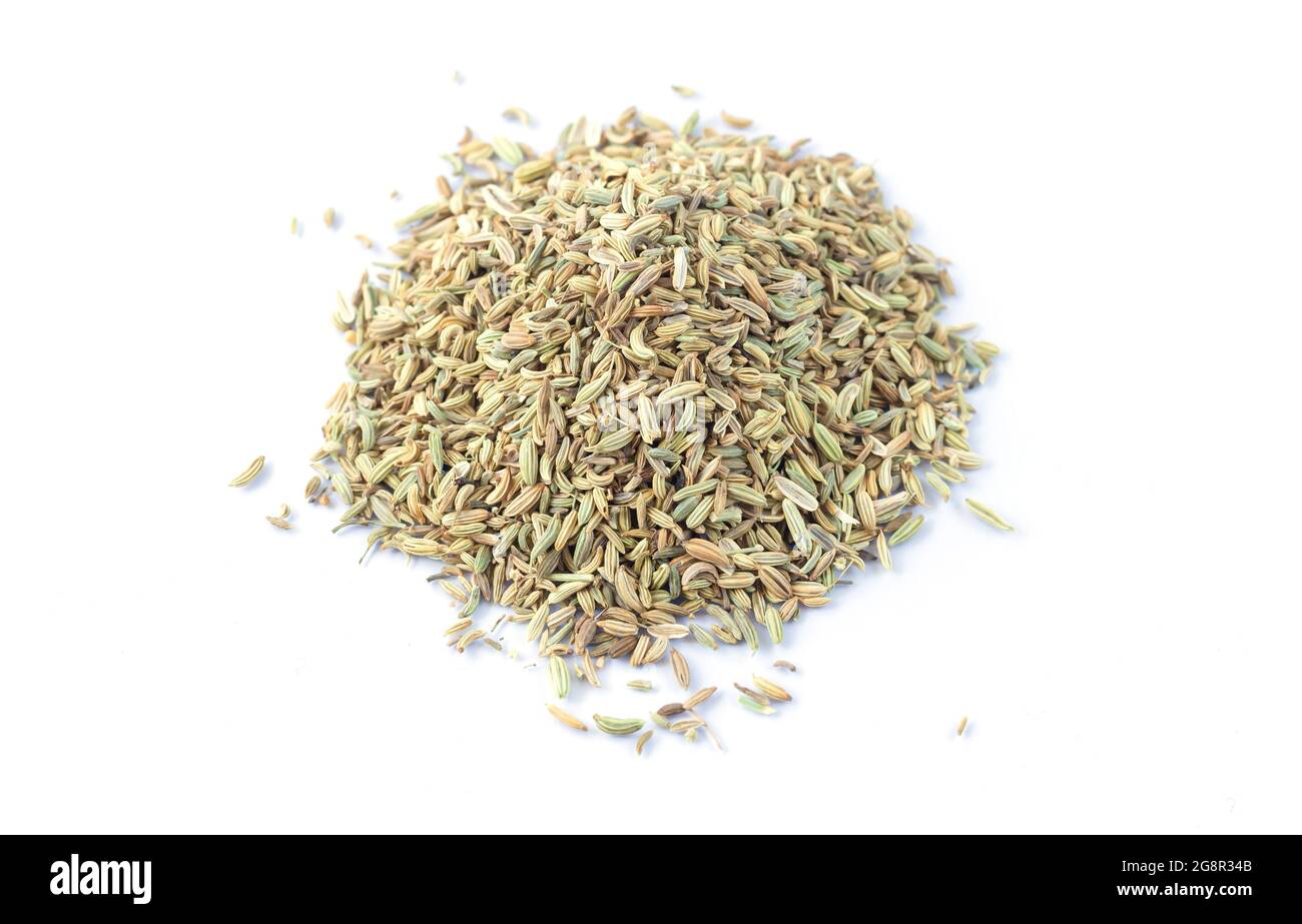 Pile of dried fennel seeds isolated on white background Stock Photo - Alamy