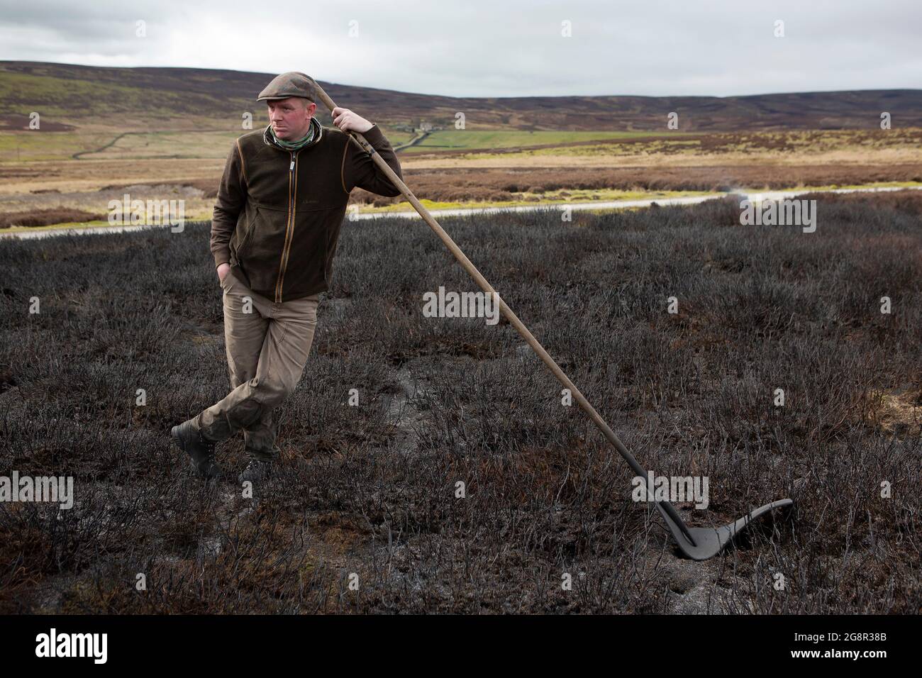 Tom Adamson, Gamekeeper for the Bolton Abbey Estate with a Batter which ...