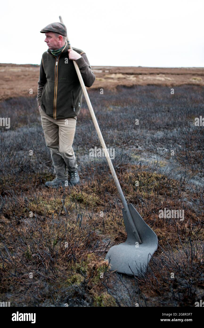 Tom Adamson, Gamekeeper for the Bolton Abbey Estate with a Batter which ...