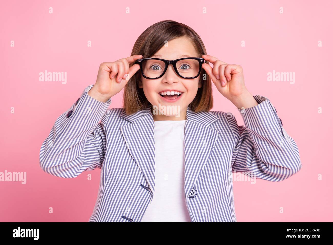 Portrait of attractive cheerful amazed intellectual girl learner ...