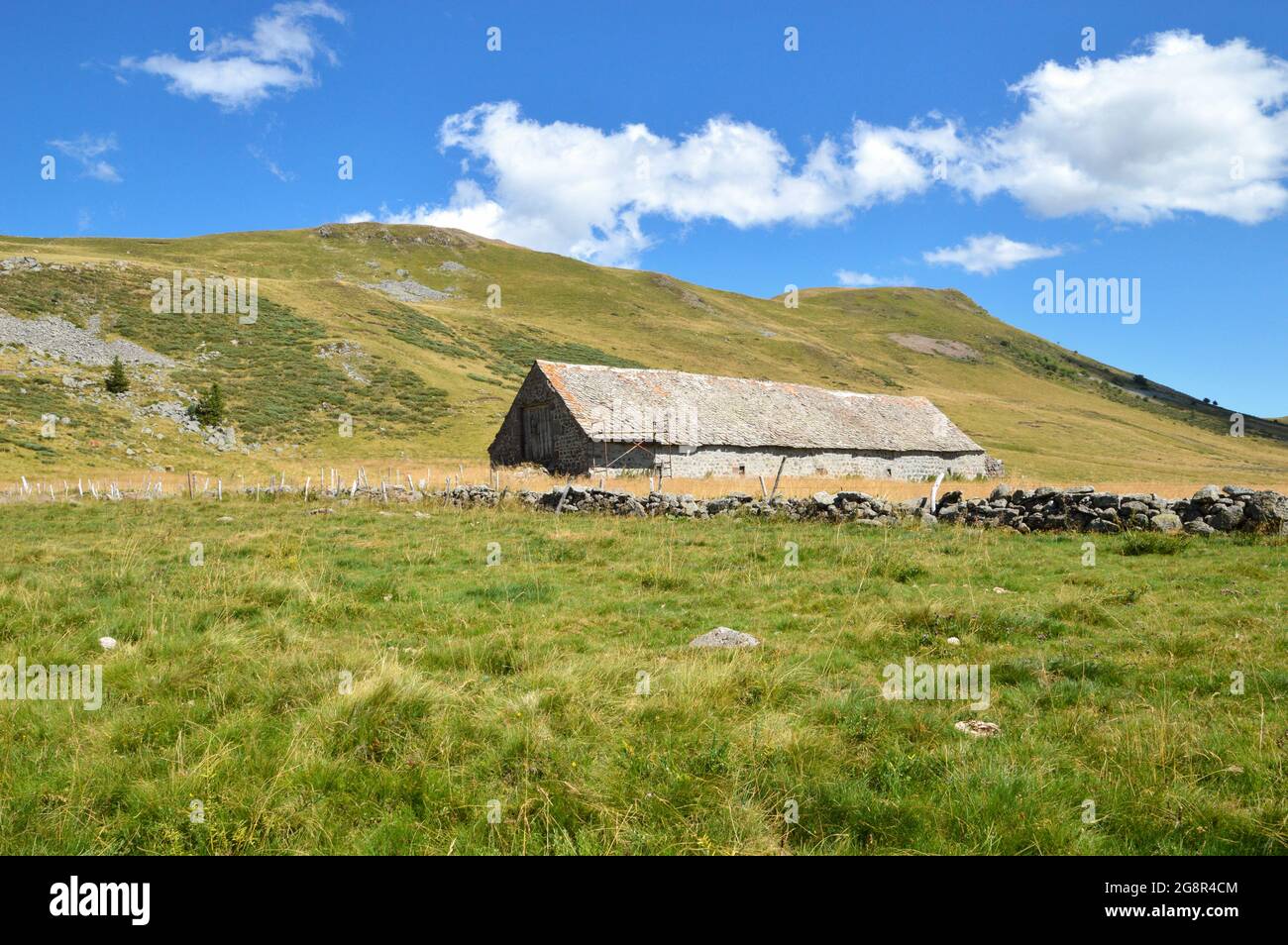 Beautiful landscape with a volcanic mountains and a mountain stable ...