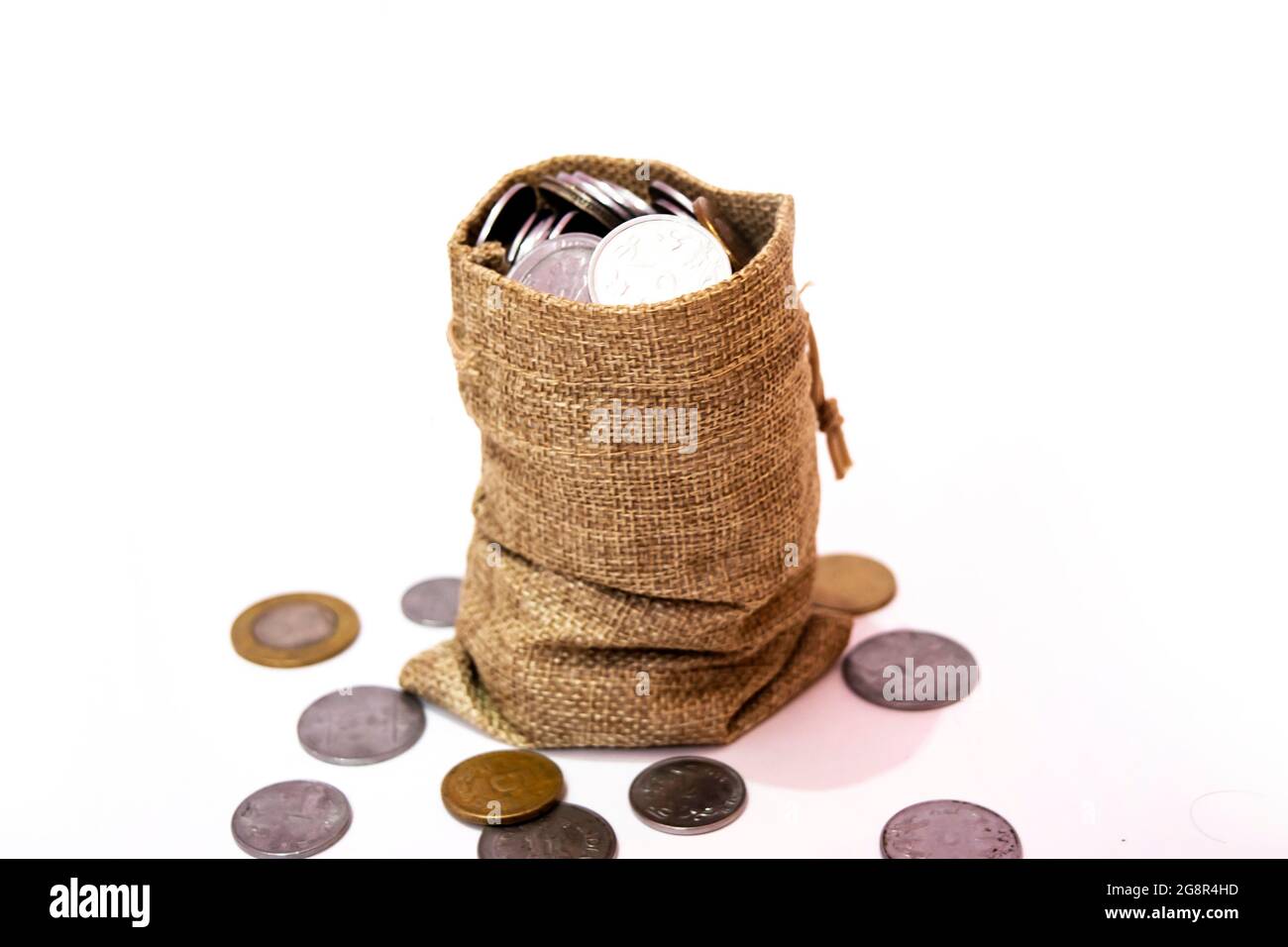 Stack of Indian rupees coin bag isolated on white background Stock ...