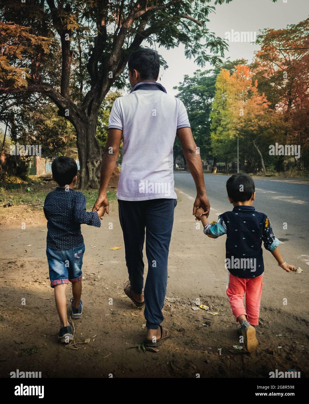 Two Children Holding Hands