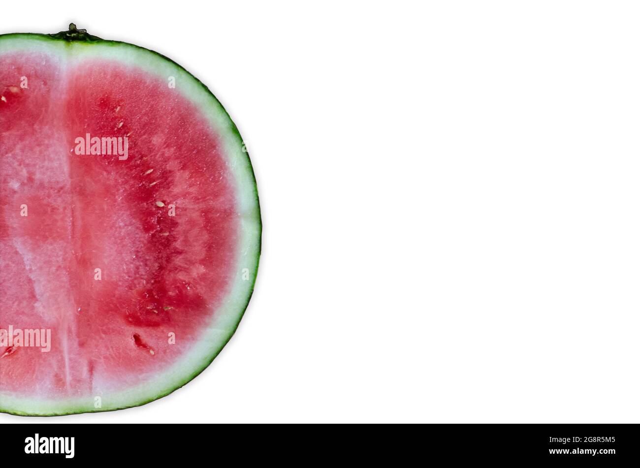 half of a watermelon in a corner with a white background Stock Photo ...
