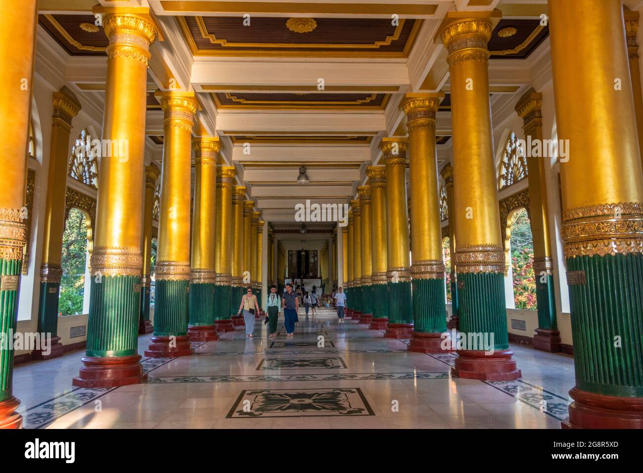 Golden pillars inside Shwedagon Pagoda in historic Temple Complex ...