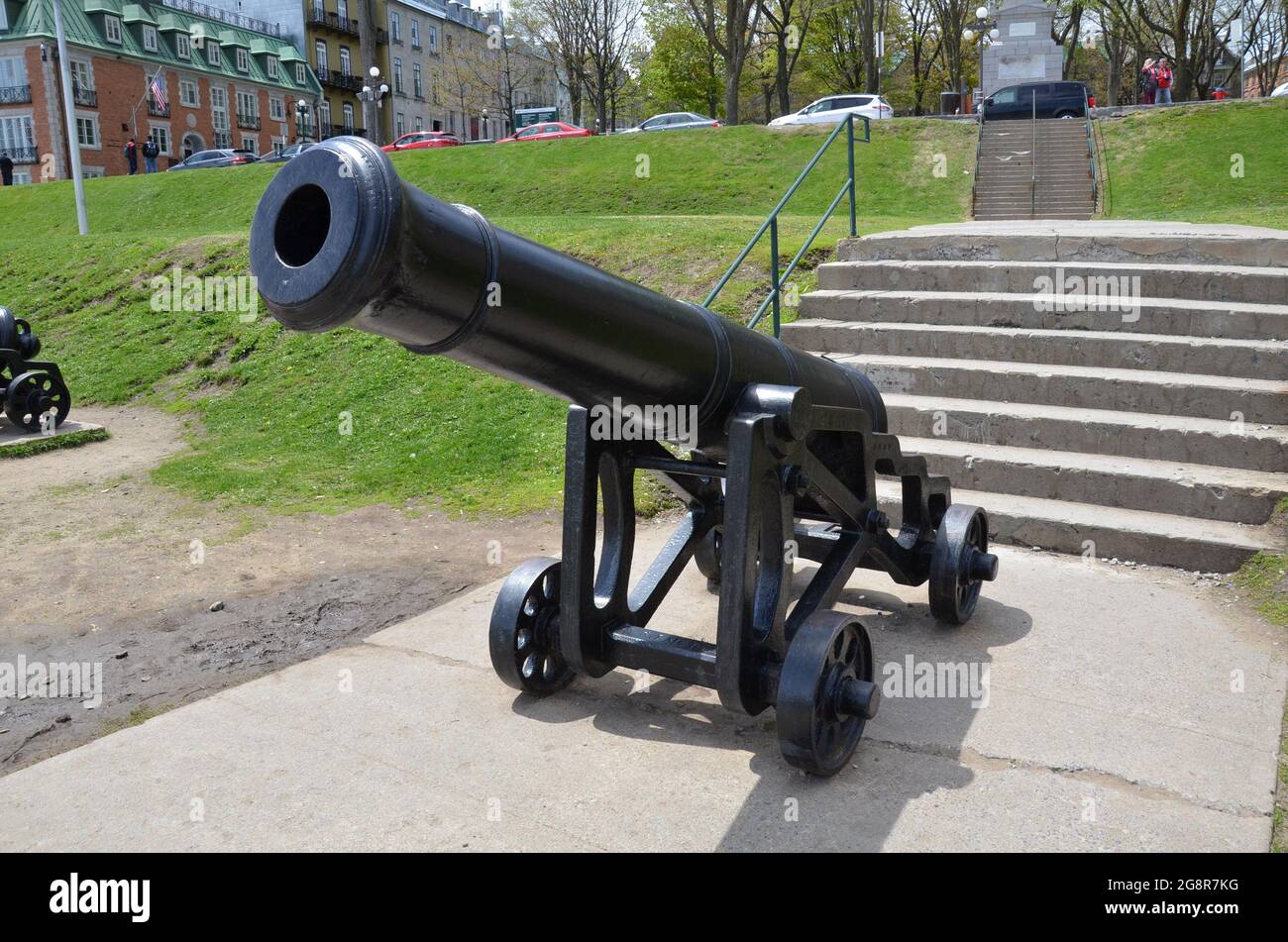 black iron metal cannon weapon and steps in Quebec Canada Stock Photo ...