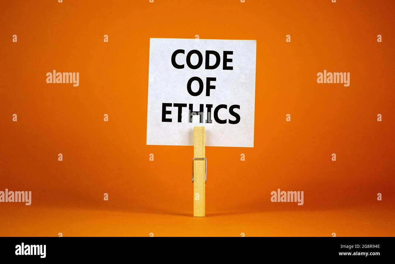 Code of ethics symbol. White paper with words 'Code of ethics', clip on ...