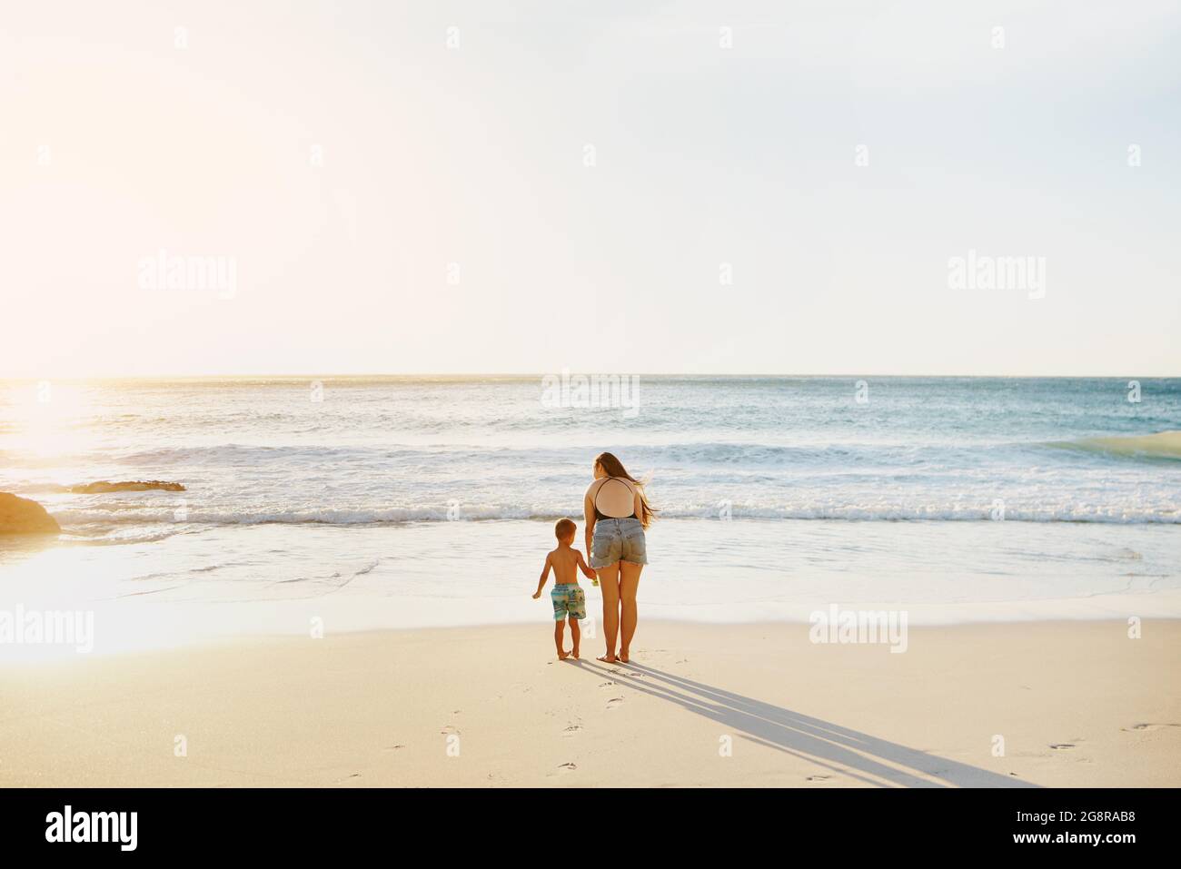 Summer is the backdrop for their beautiful family moments Stock Photo ...