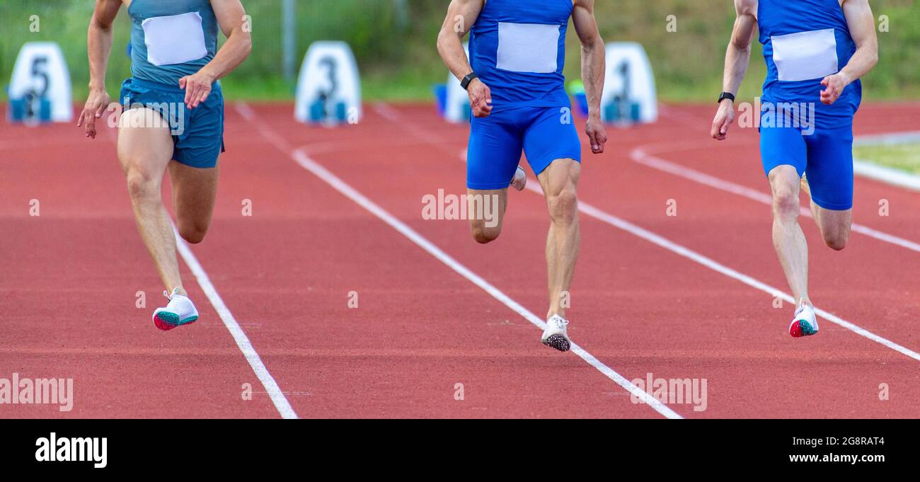 Athletics people running on the track field. Professional sport concept ...