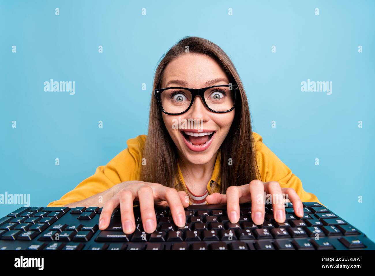 Photo of young pretty woman happy positive smile play computer game ...