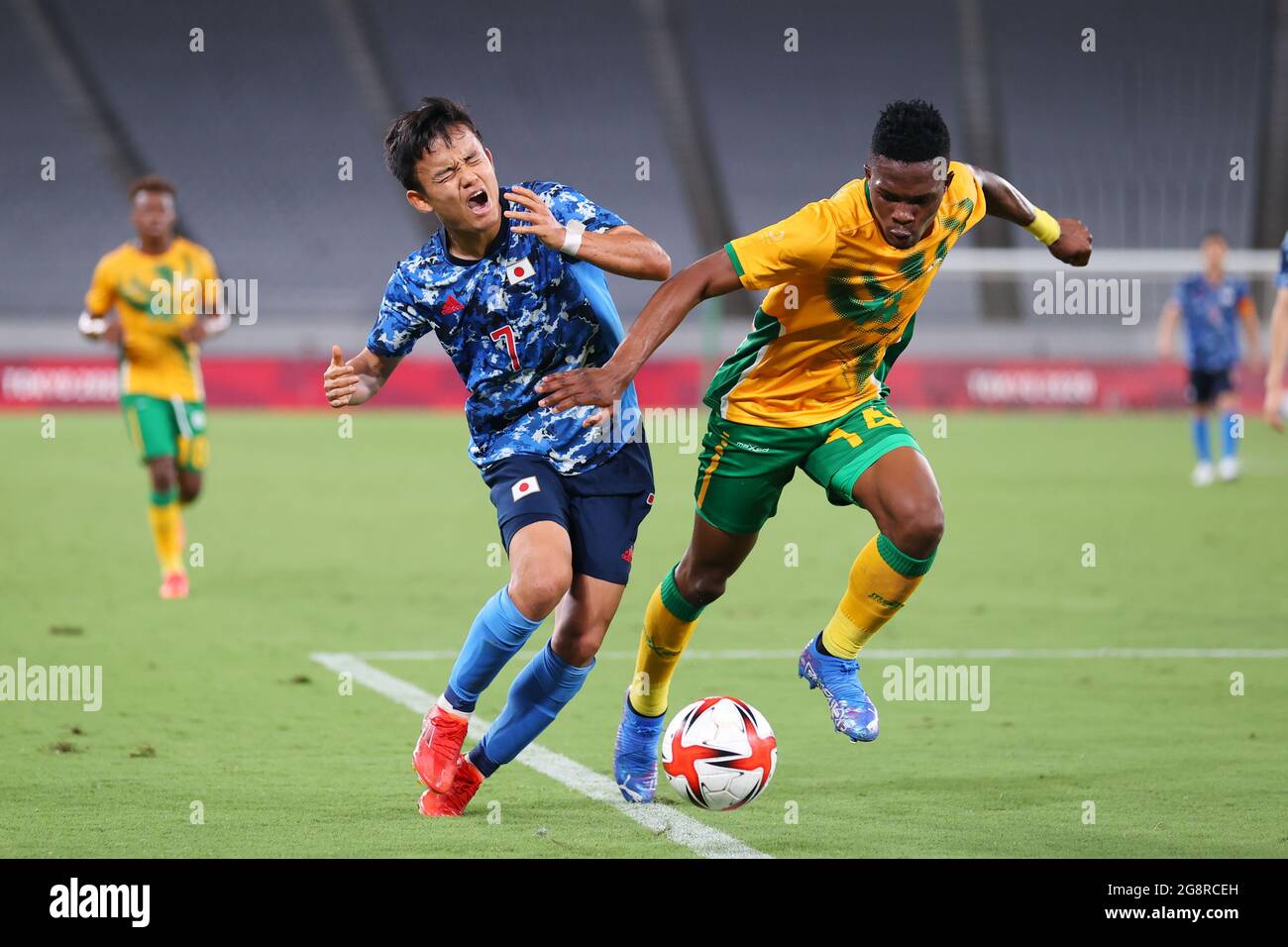 Tokyo, Japan. 22nd July, 2021. (L to R) Takefusa Kubo (JPN), Sibusiso ...
