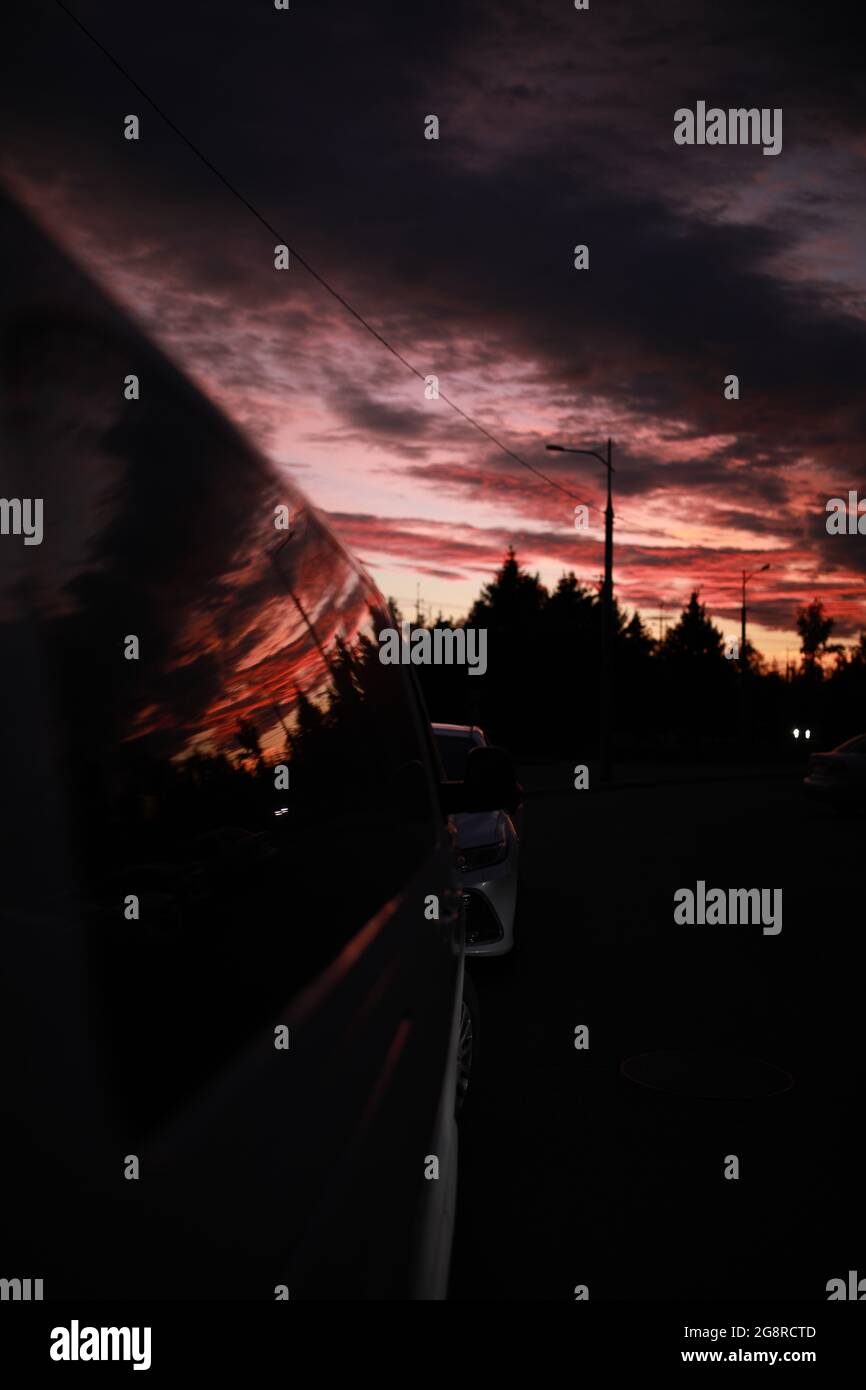 A stop sign lit up at night Stock Photo - Alamy