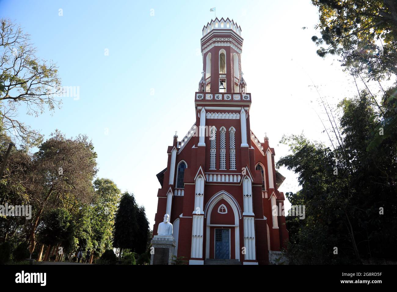 Beautiful church in forest area with blue sky Stock Photo - Alamy