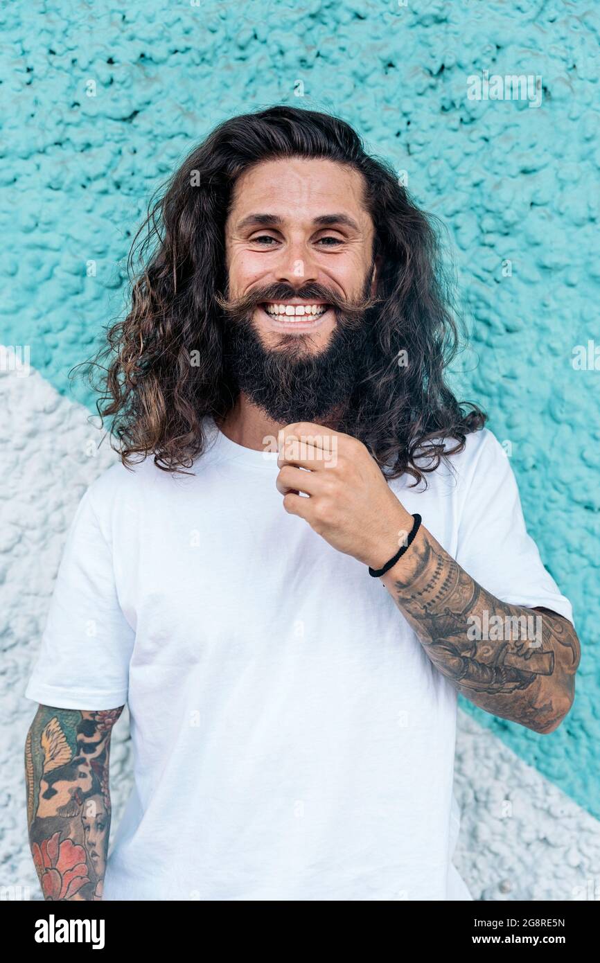 Bearded man with long hair hi-res stock photography and images - Alamy
