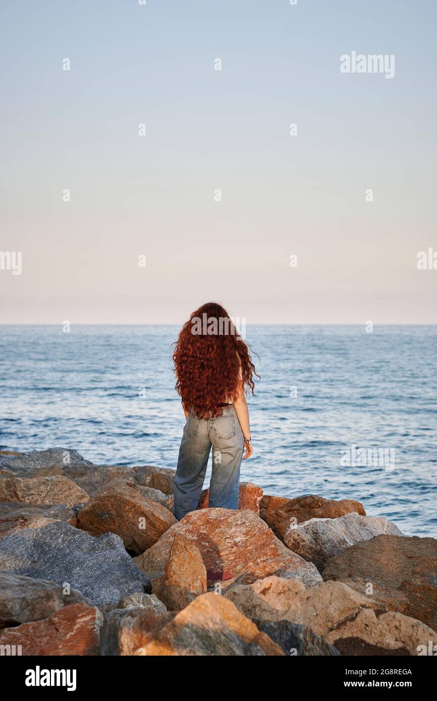 Long hair redhead woman back hi-res stock photography and images - Alamy