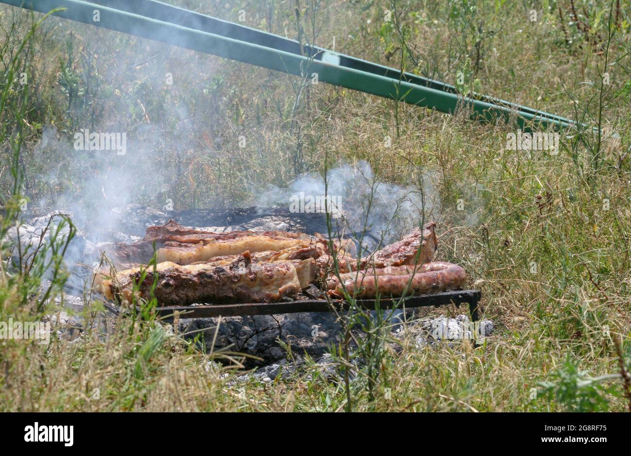 Argentine barbecue grilling in the field Stock Photo - Alamy