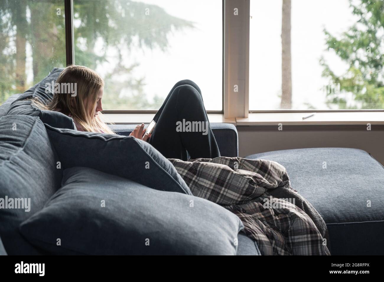Old blue sofa hi-res stock photography and images - Alamy