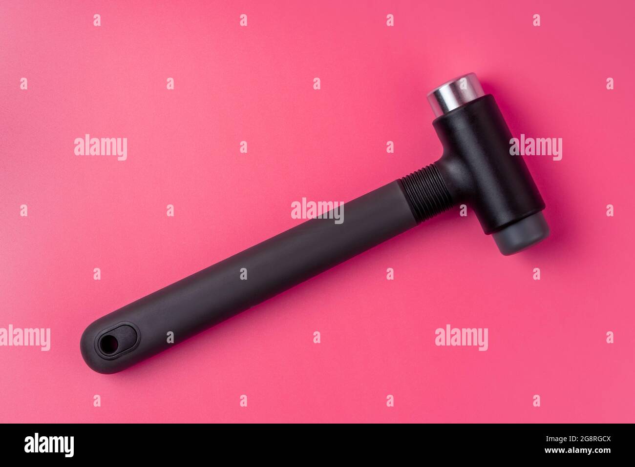 Steel claw hammer with rubber handle,isolated on pink background Stock ...