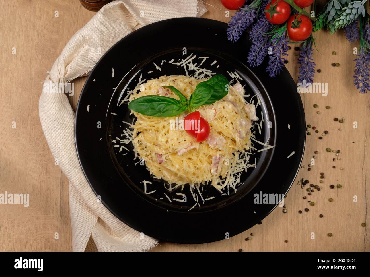 Pasta carbonara italian feed Basil Stock Photo - Alamy