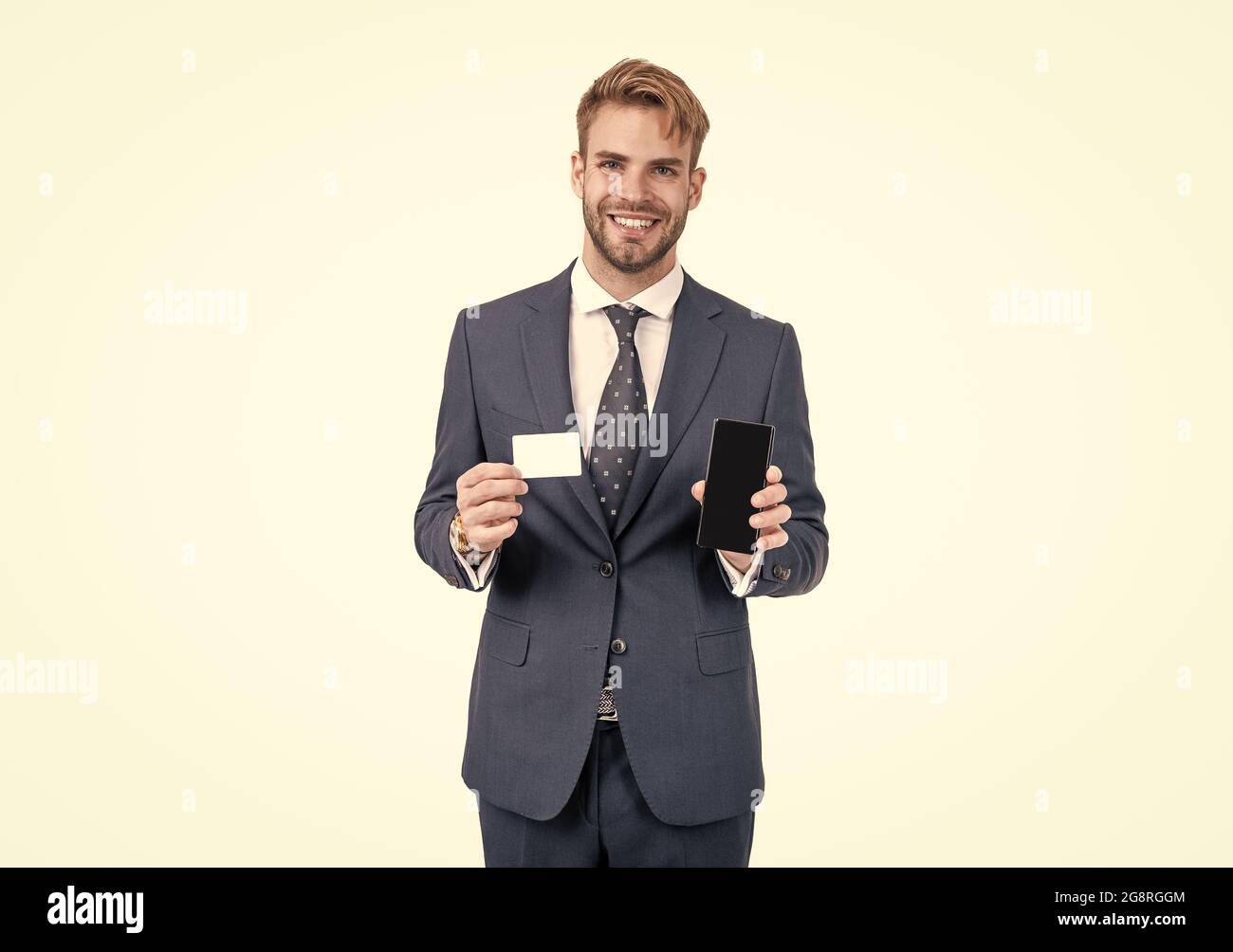 Happy smart operator hold mobile phone and contact business card for ...